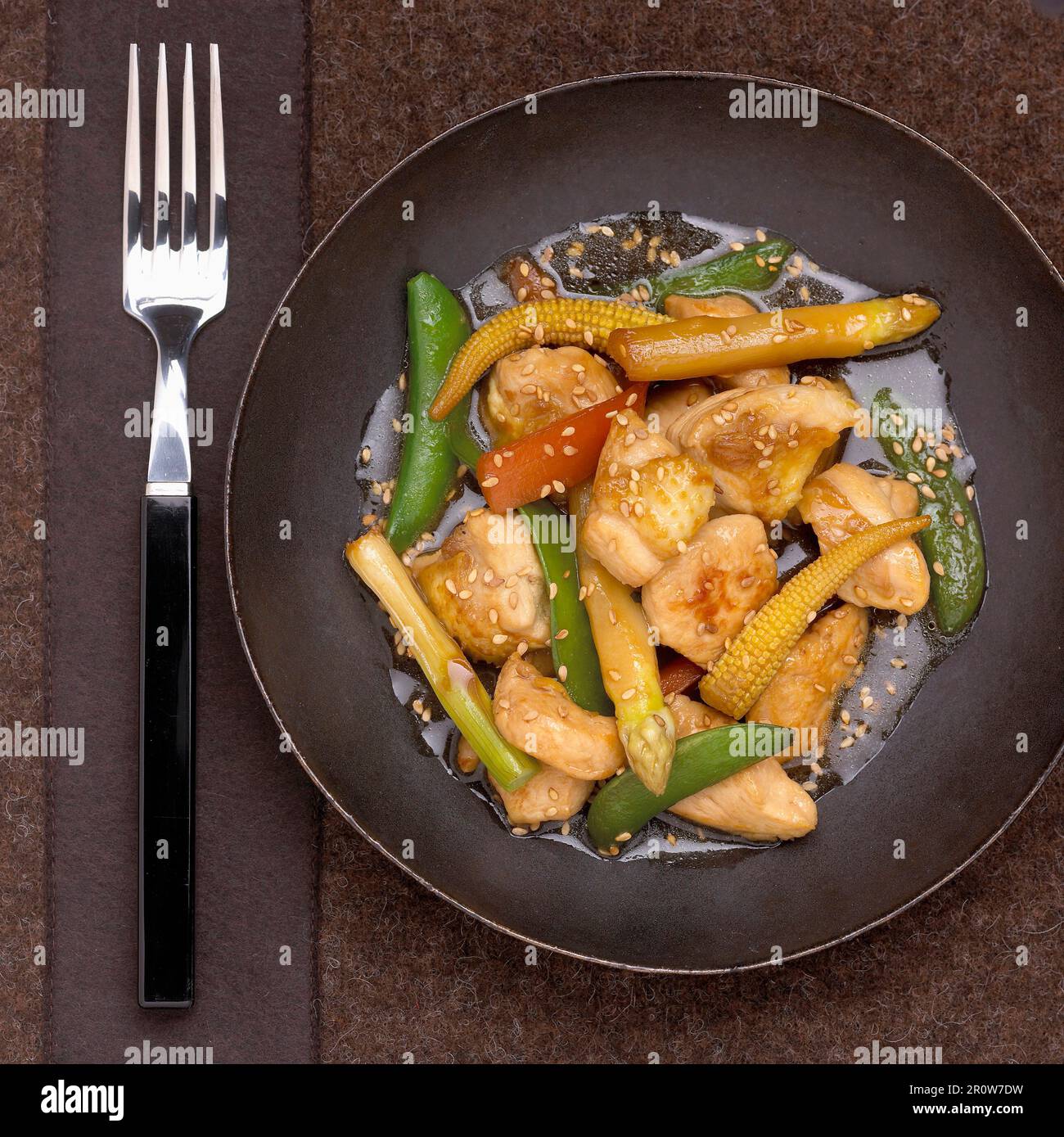Landes chicken and vegetables cooked in a wok Stock Photo - Alamy