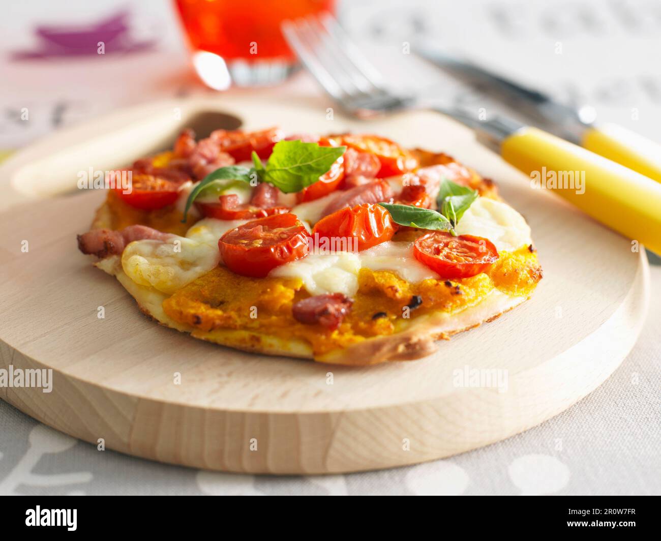 Small pumpkin,tomato and mozzarella pizza Stock Photo - Alamy