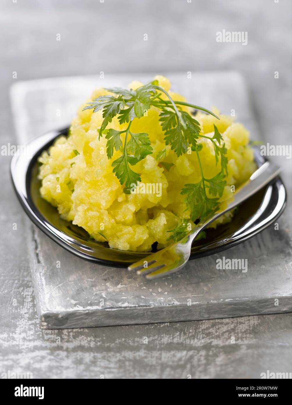 Mashed potatoes with olive oil and herbs Stock Photo - Alamy