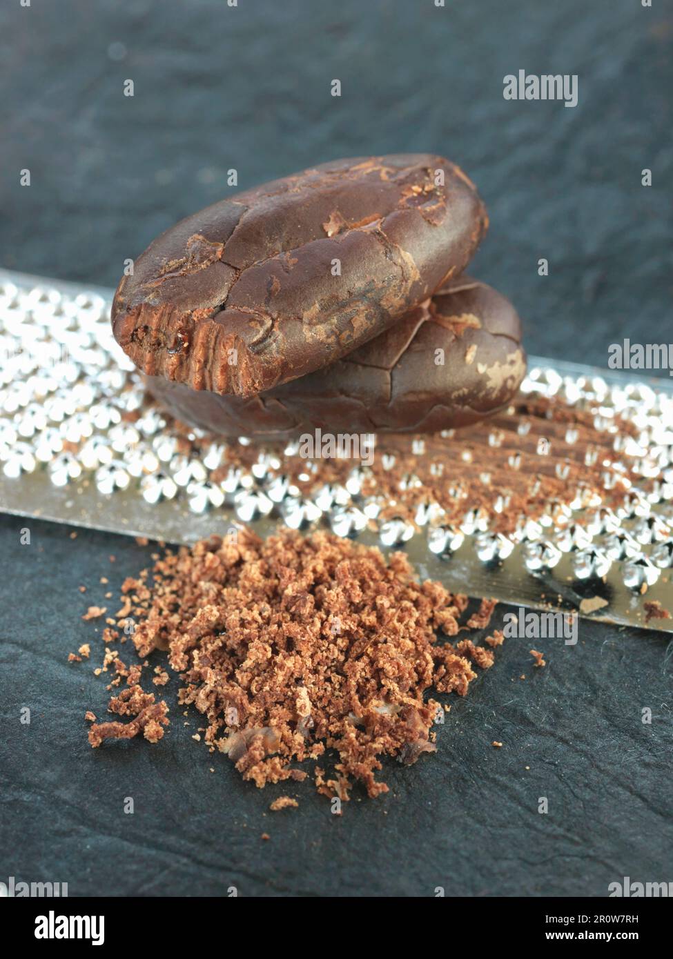 Grating a cocoa bean Stock Photo - Alamy