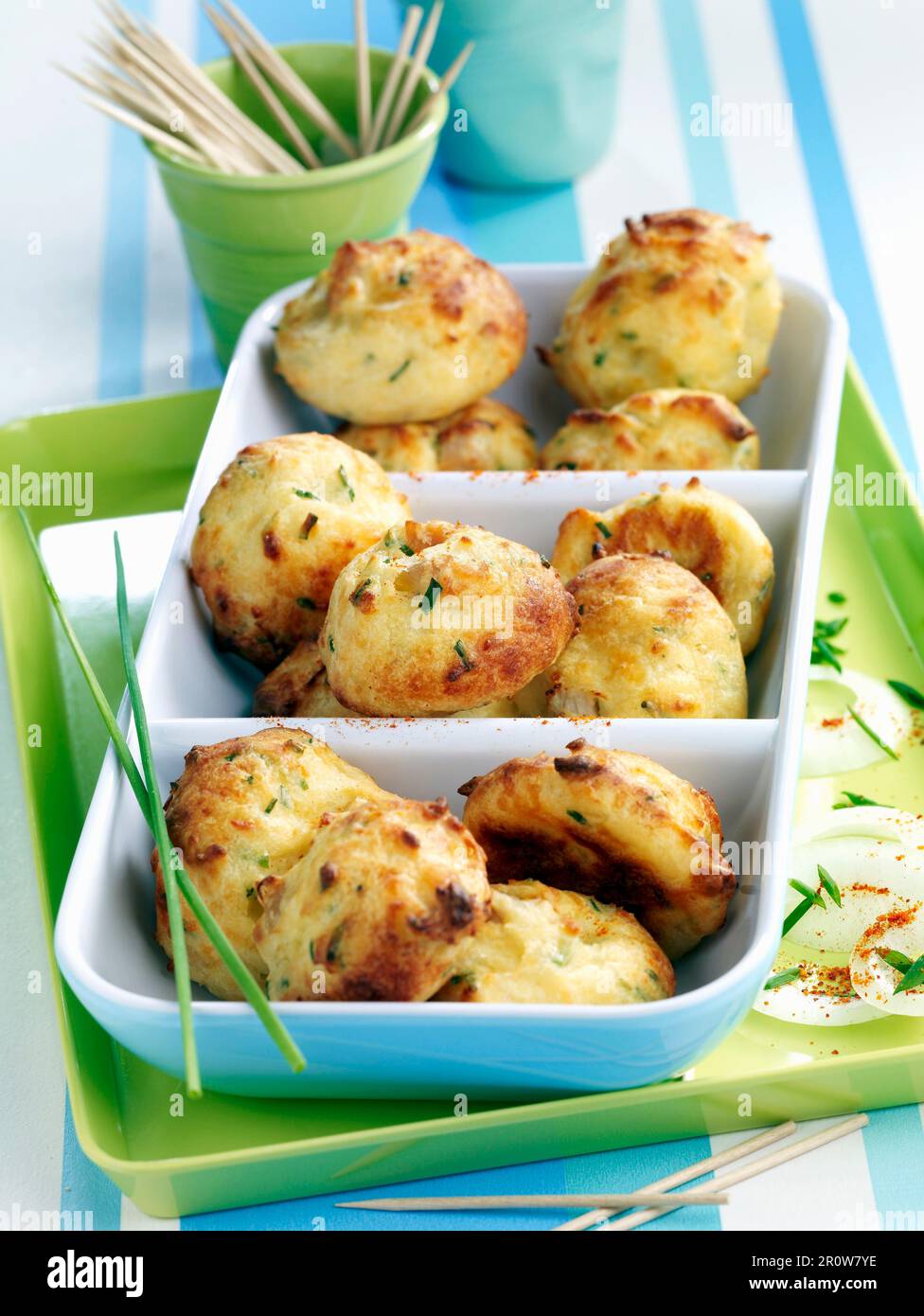 Mashed potato, Emmental, raw ham and chive appetizers Stock Photo - Alamy