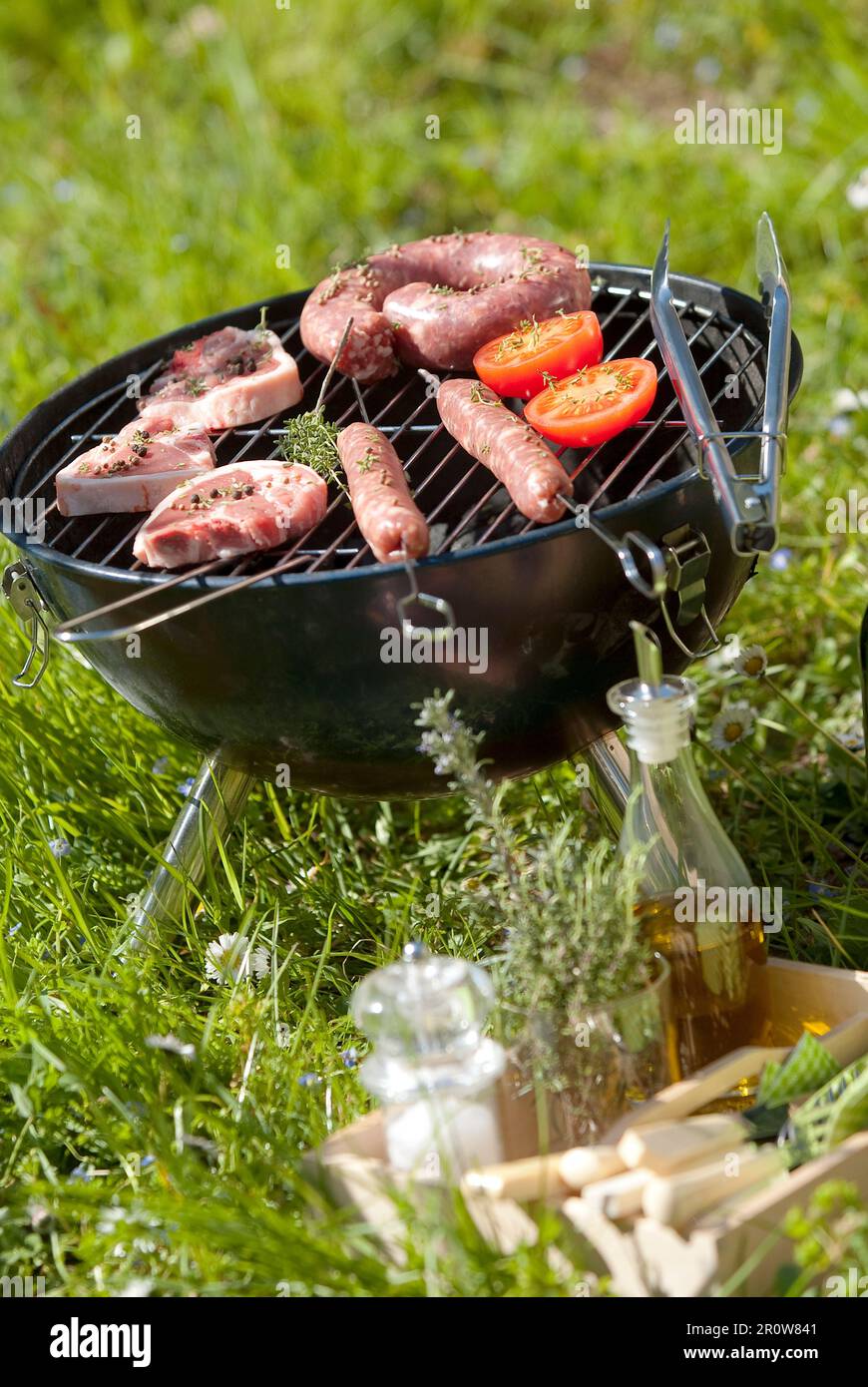 Cooking meat on the barbecue Stock Photo - Alamy