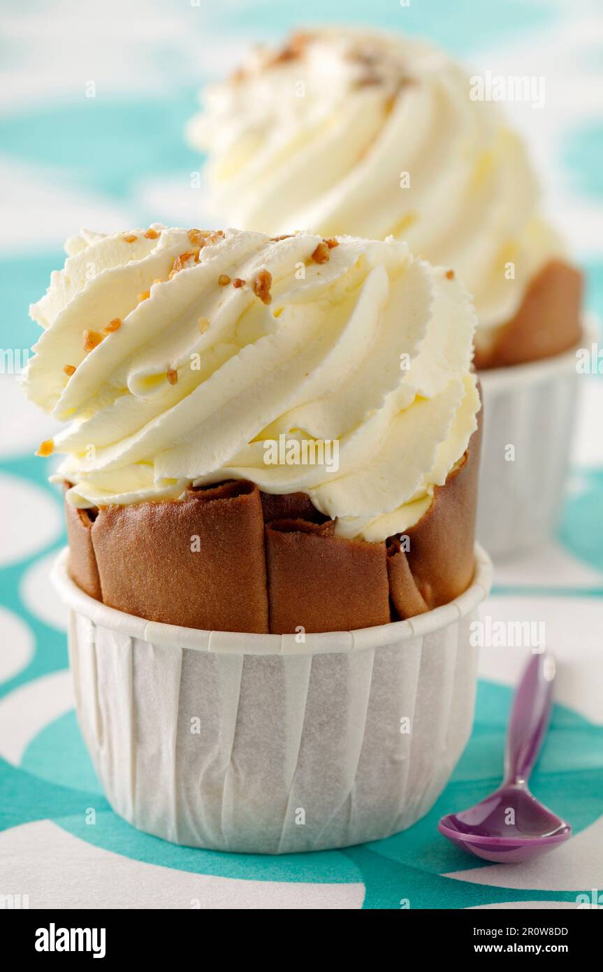 Tulipe biscuit filled with whipped cream Stock Photo - Alamy