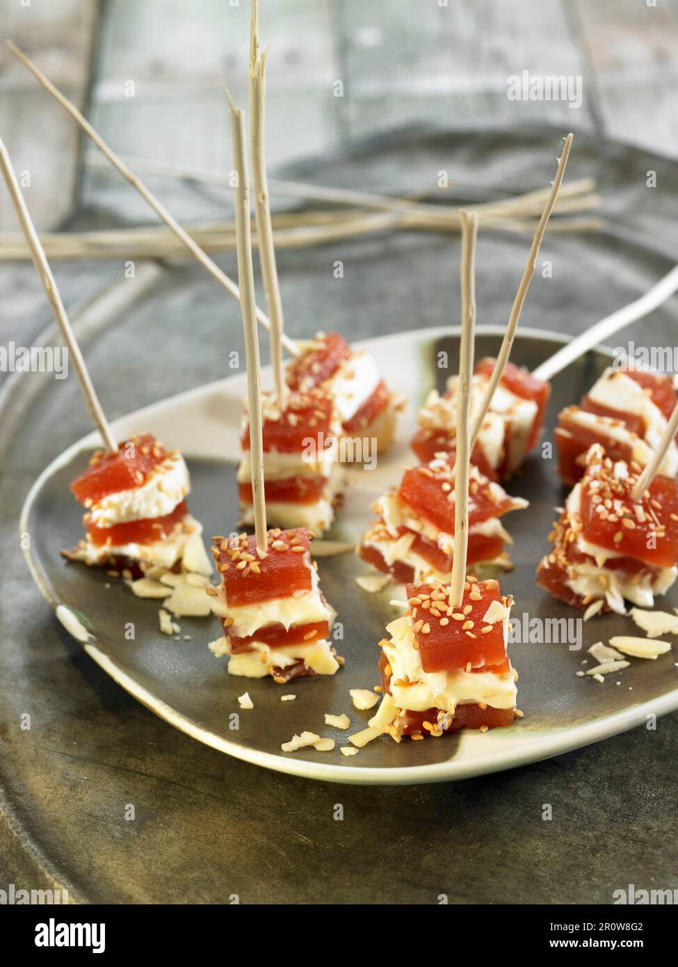 Quince paste, cream cheese and sesame seed appetizers Stock Photo - Alamy