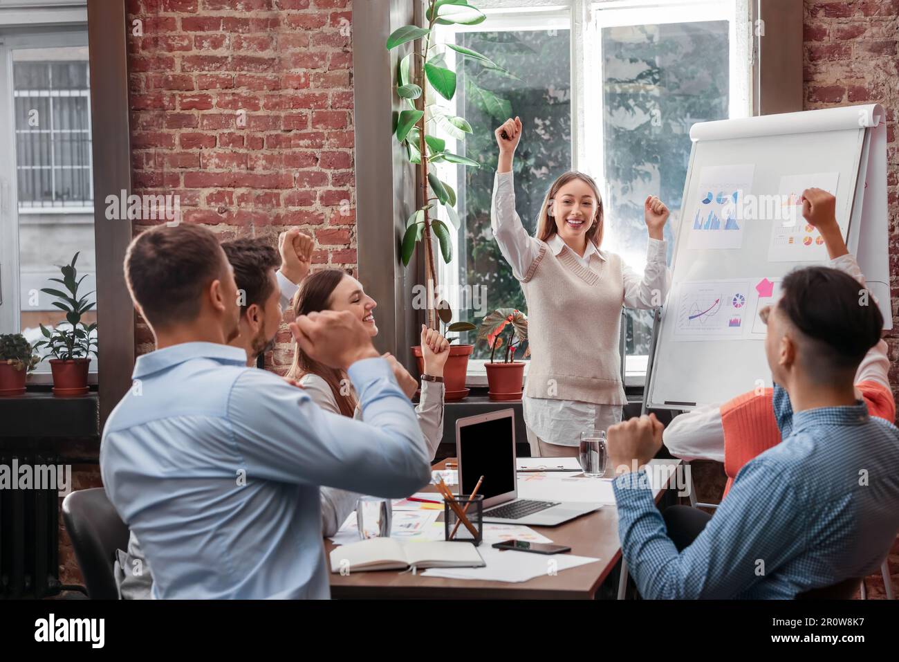 Employees having meeting in office. Team work Stock Photo - Alamy