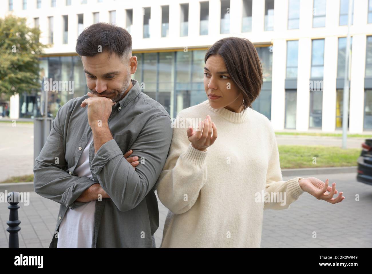 Woman annoyed by man street hi-res stock photography and images - Alamy