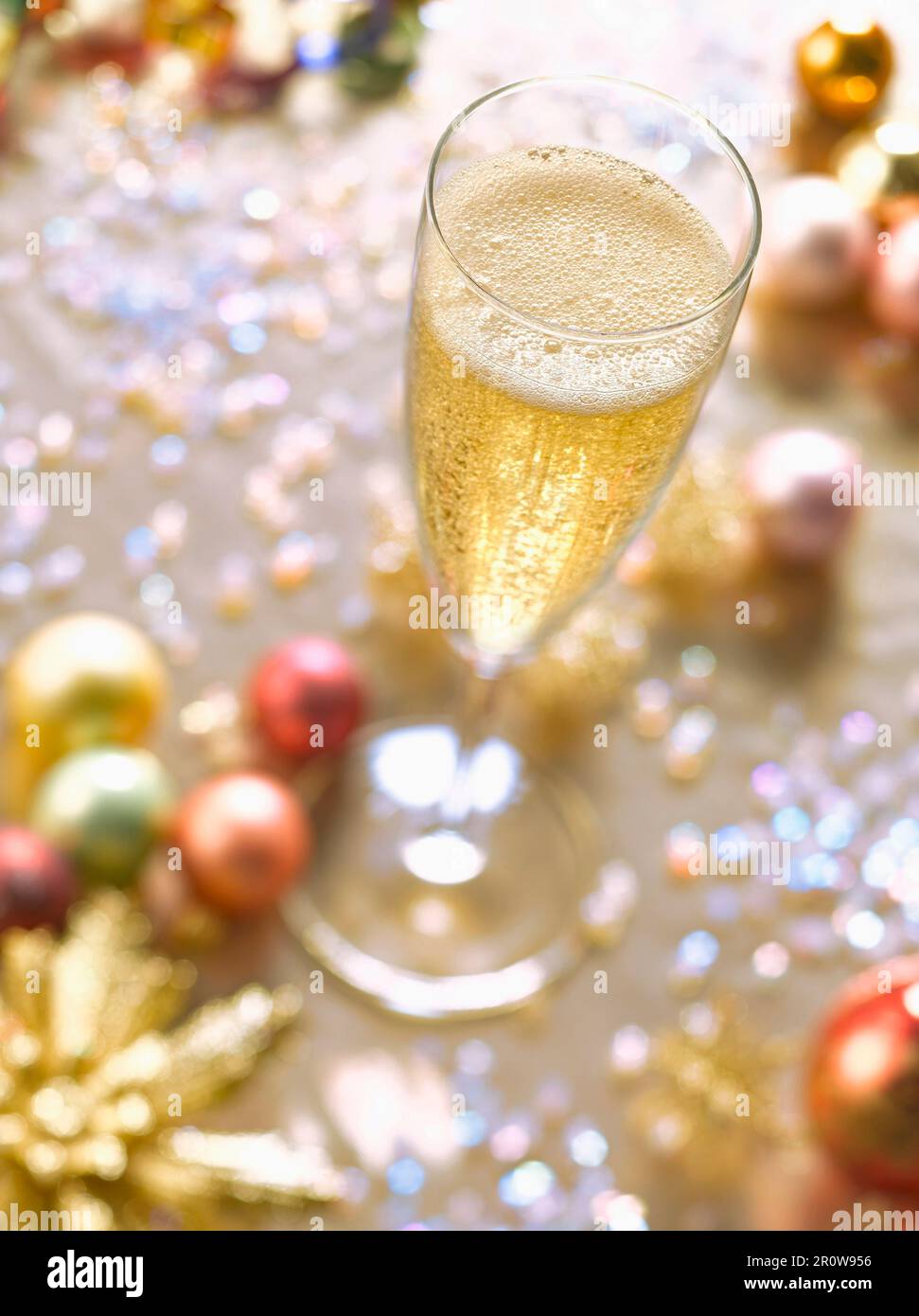 Champagne glass and Christmas decorations Stock Photo - Alamy