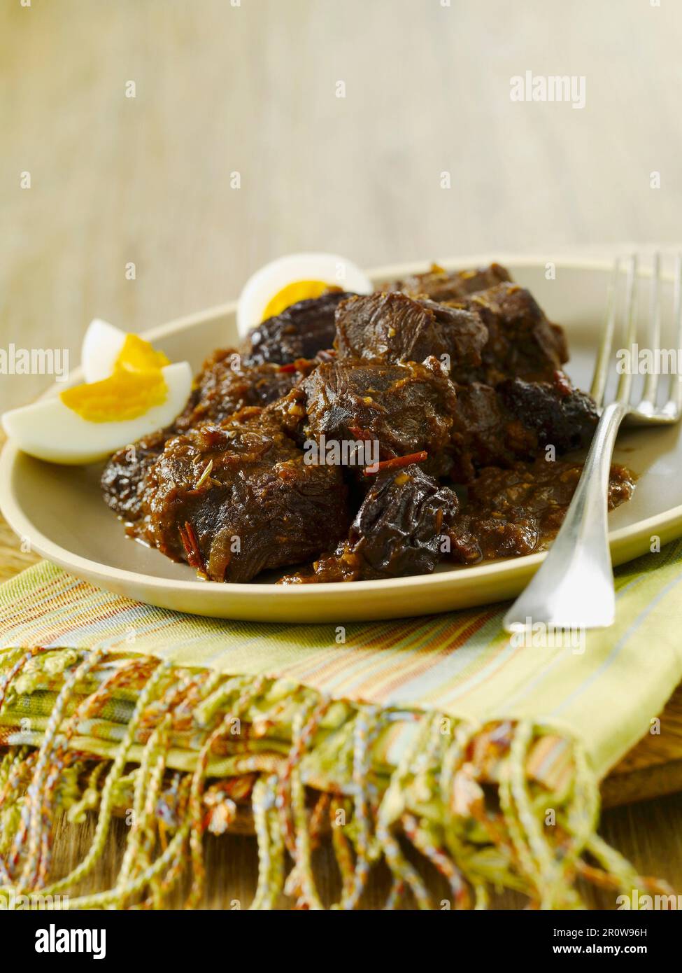 Meat and prune Tajine with hard-boiled eggs Stock Photo - Alamy