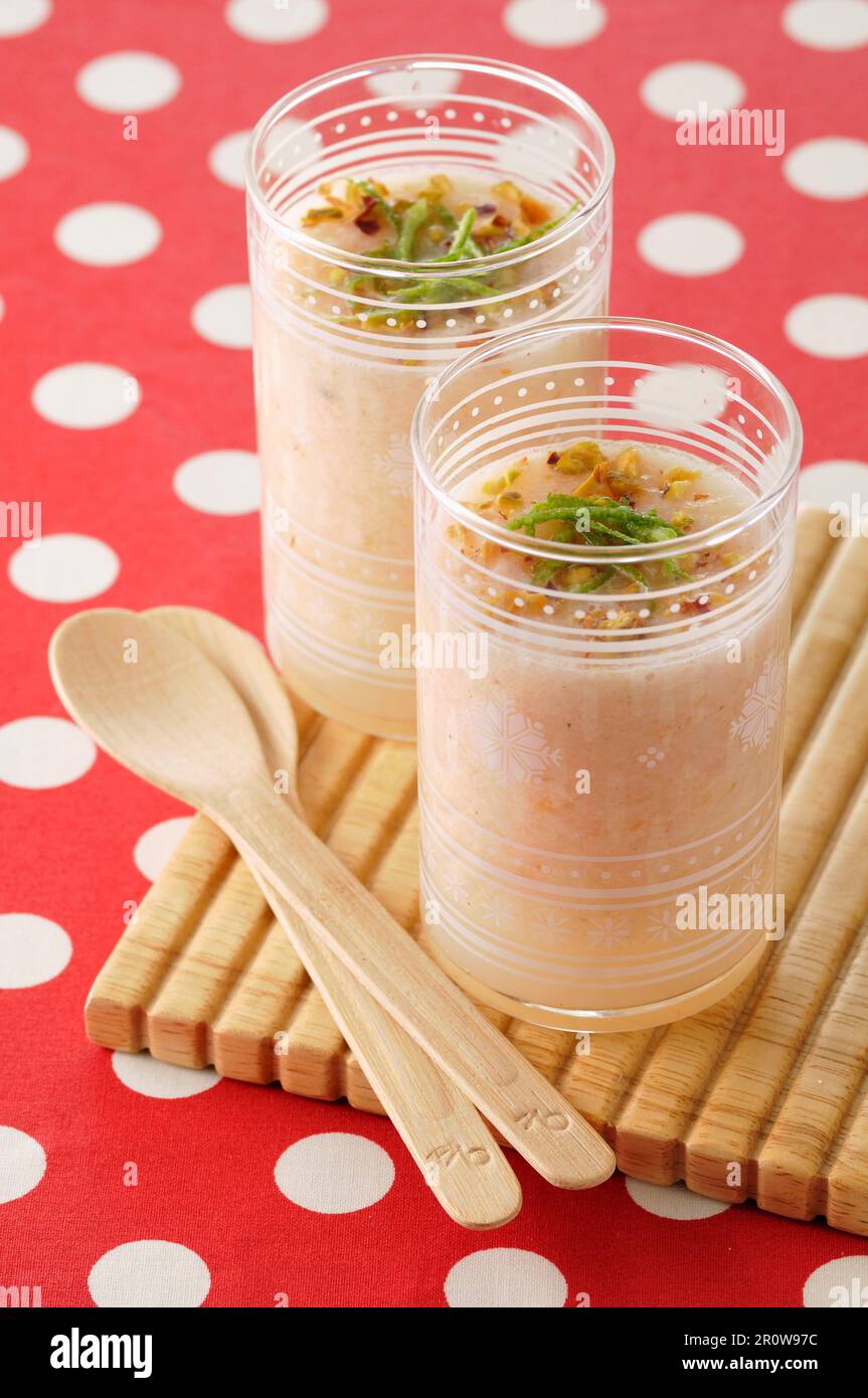 Lychee soup with pistachios Stock Photo - Alamy