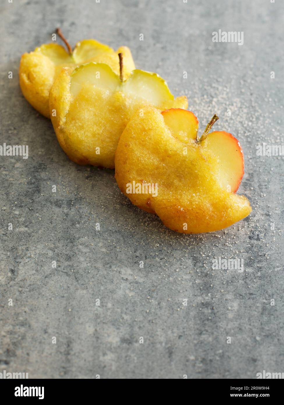 Fried battered apple fritters hi-res stock photography and images - Alamy