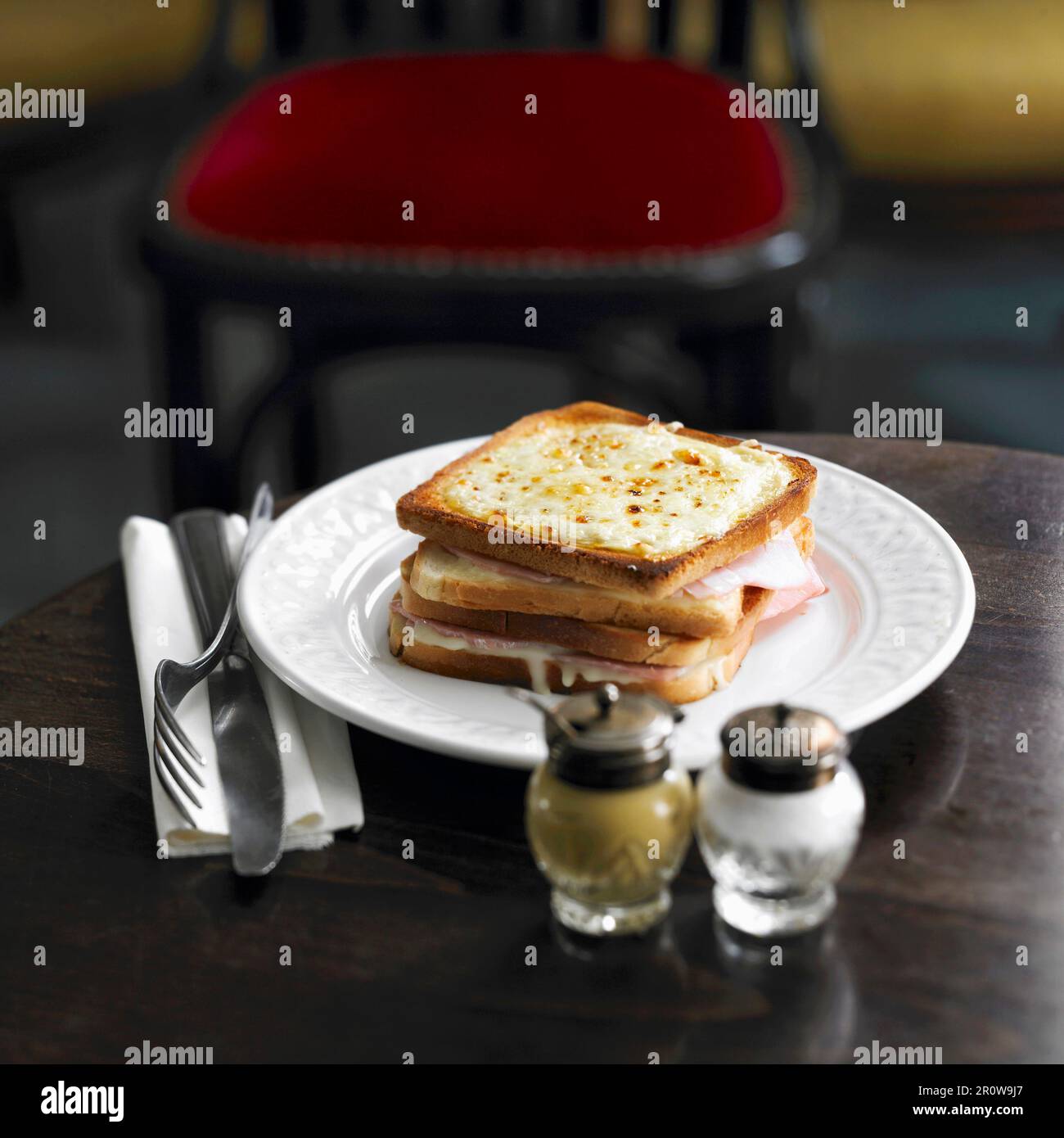 Ham and cheese toasted sandwich topped with grilled cheese Stock Photo ...