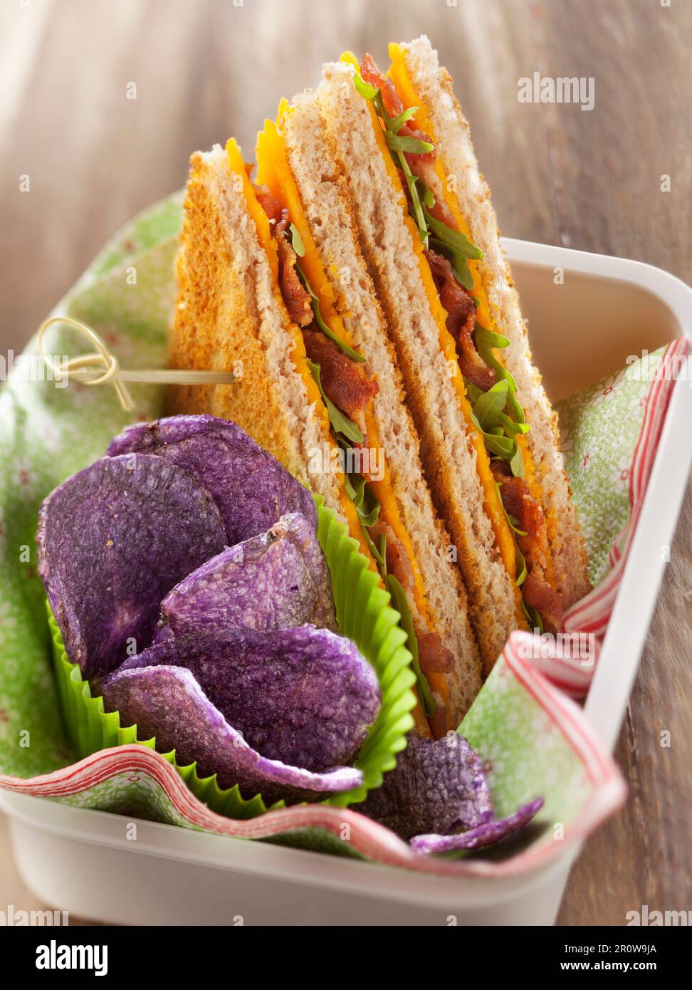 Cheddar and bacon toasted club sandwich,beetroot crisps Stock Photo - Alamy