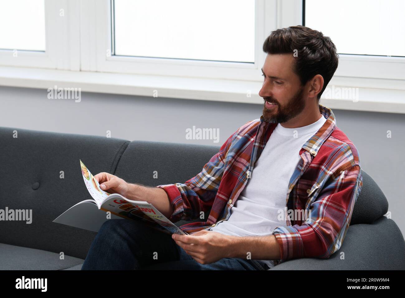 Bearded man reading hi-res stock photography and images - Alamy