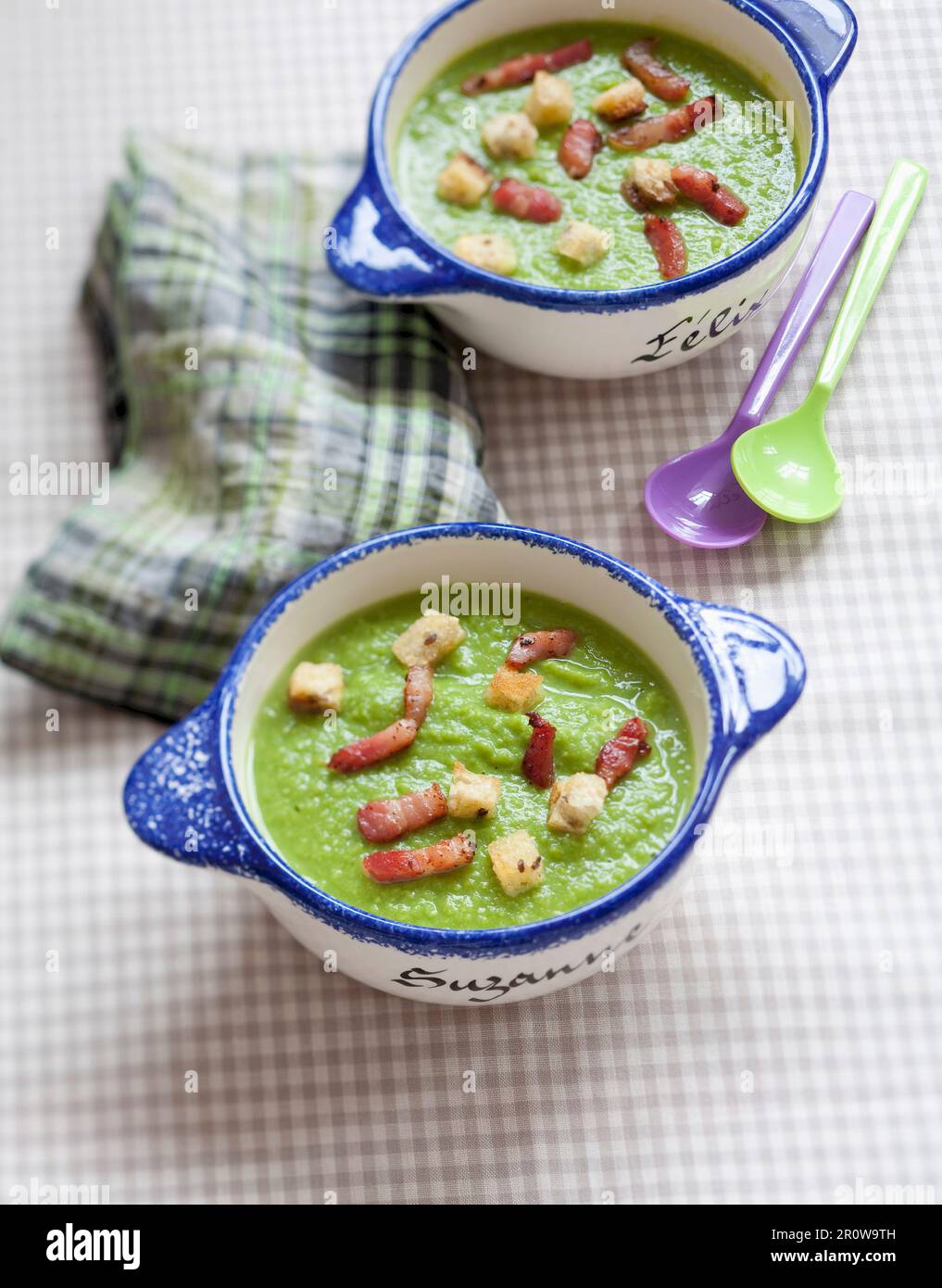 Cream of pea soup for kids Stock Photo - Alamy