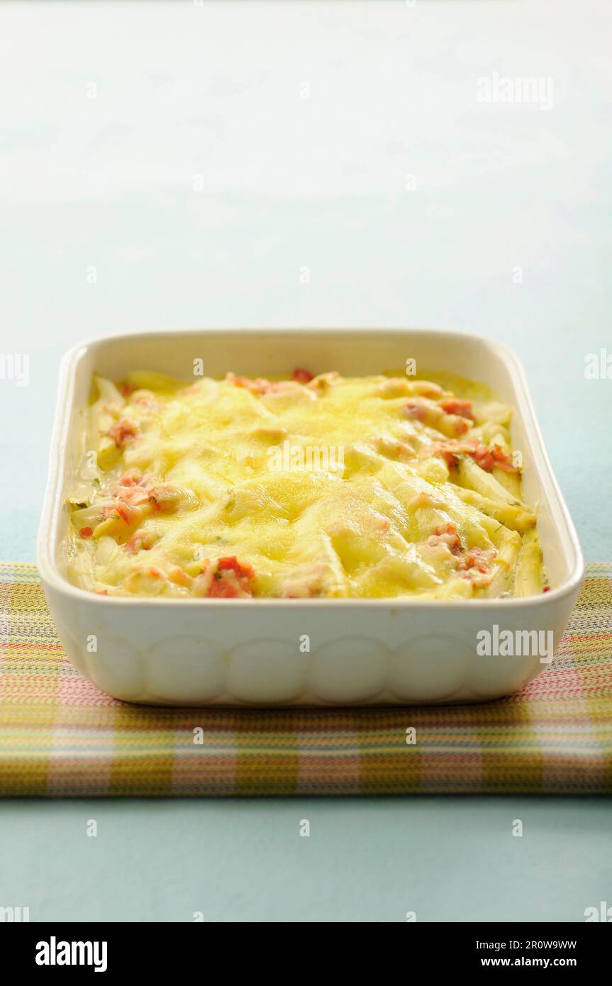 White asparagus and ham cheese-topped dish Stock Photo - Alamy