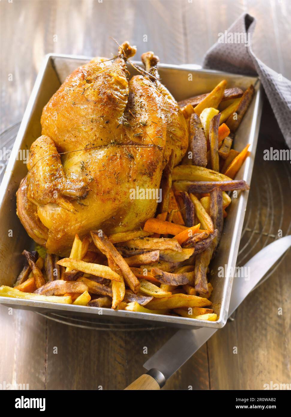 Roast chicken with three different flavored chips Stock Photo - Alamy