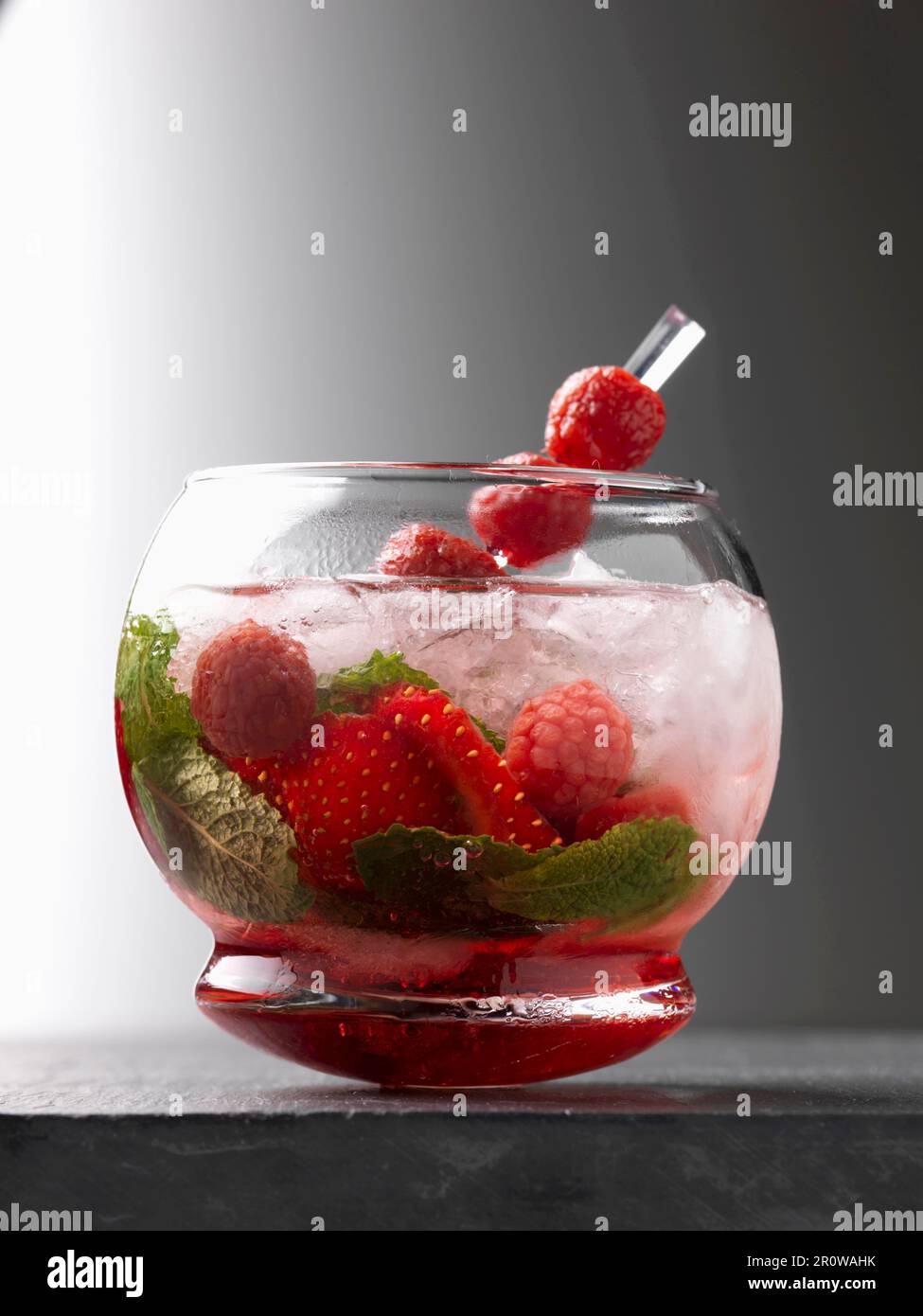 Tapis Rouge cocktail made with summer fruit and vodka Stock Photo - Alamy
