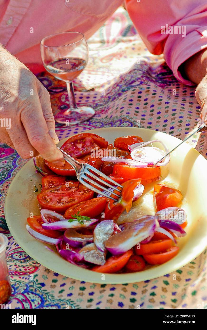 Hand mixing side dish onions hi-res stock photography and images - Alamy