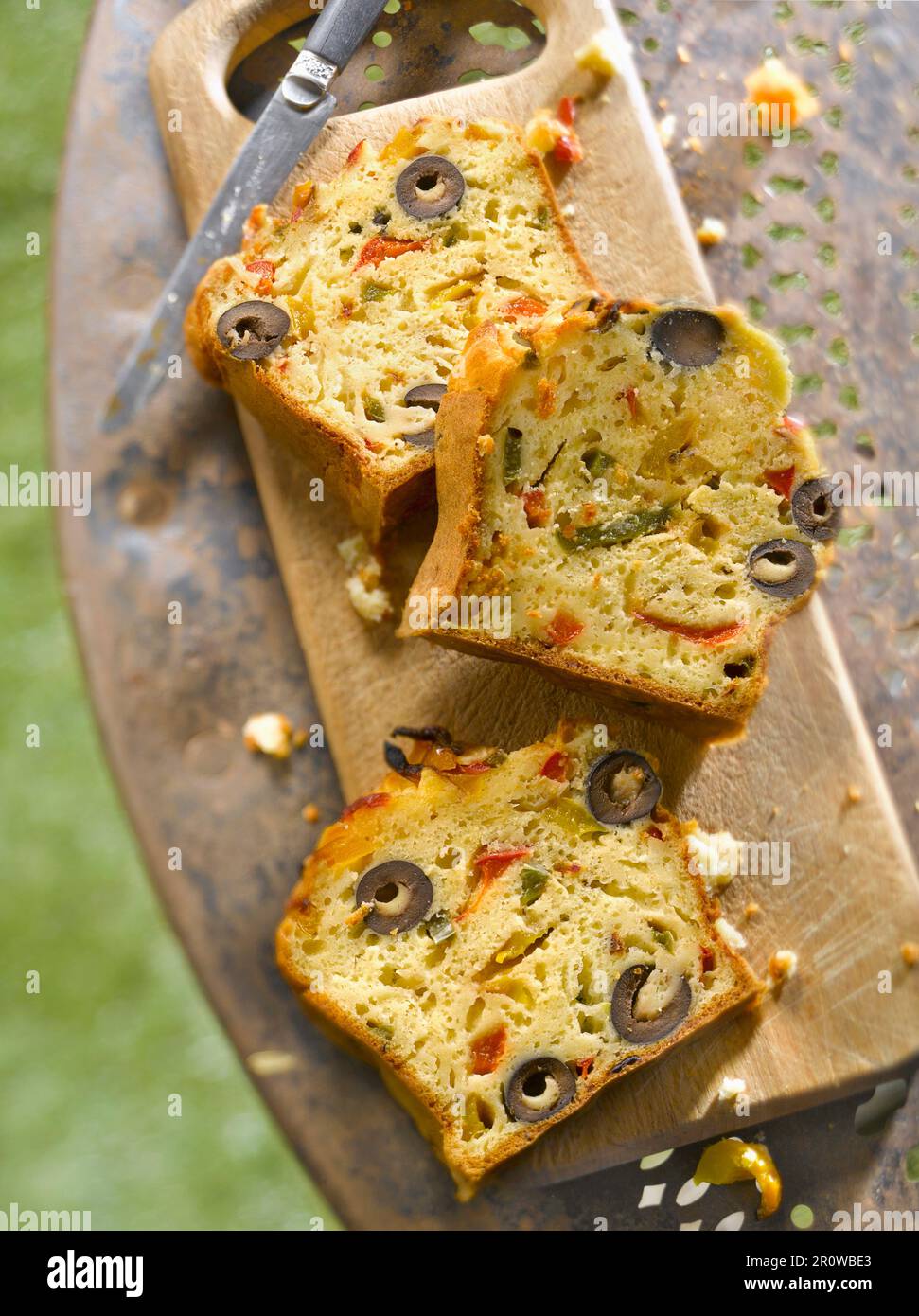 Grilled pepper, olive and pecorino savoury cake Stock Photo - Alamy