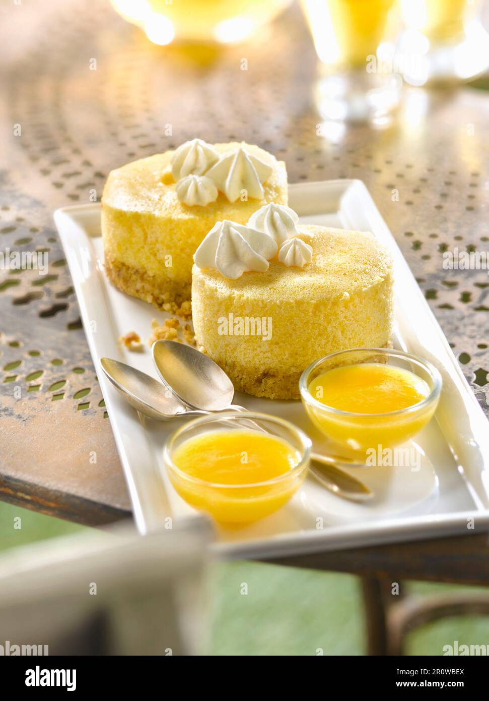 Breton shortbread cookie and peach mousse dessert served with peach ...