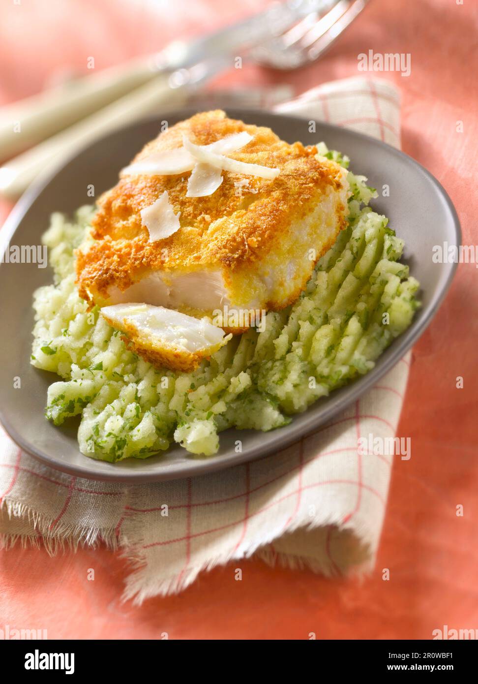 Thick piece of cod in parmesan crust, potato and parsley mash Stock ...