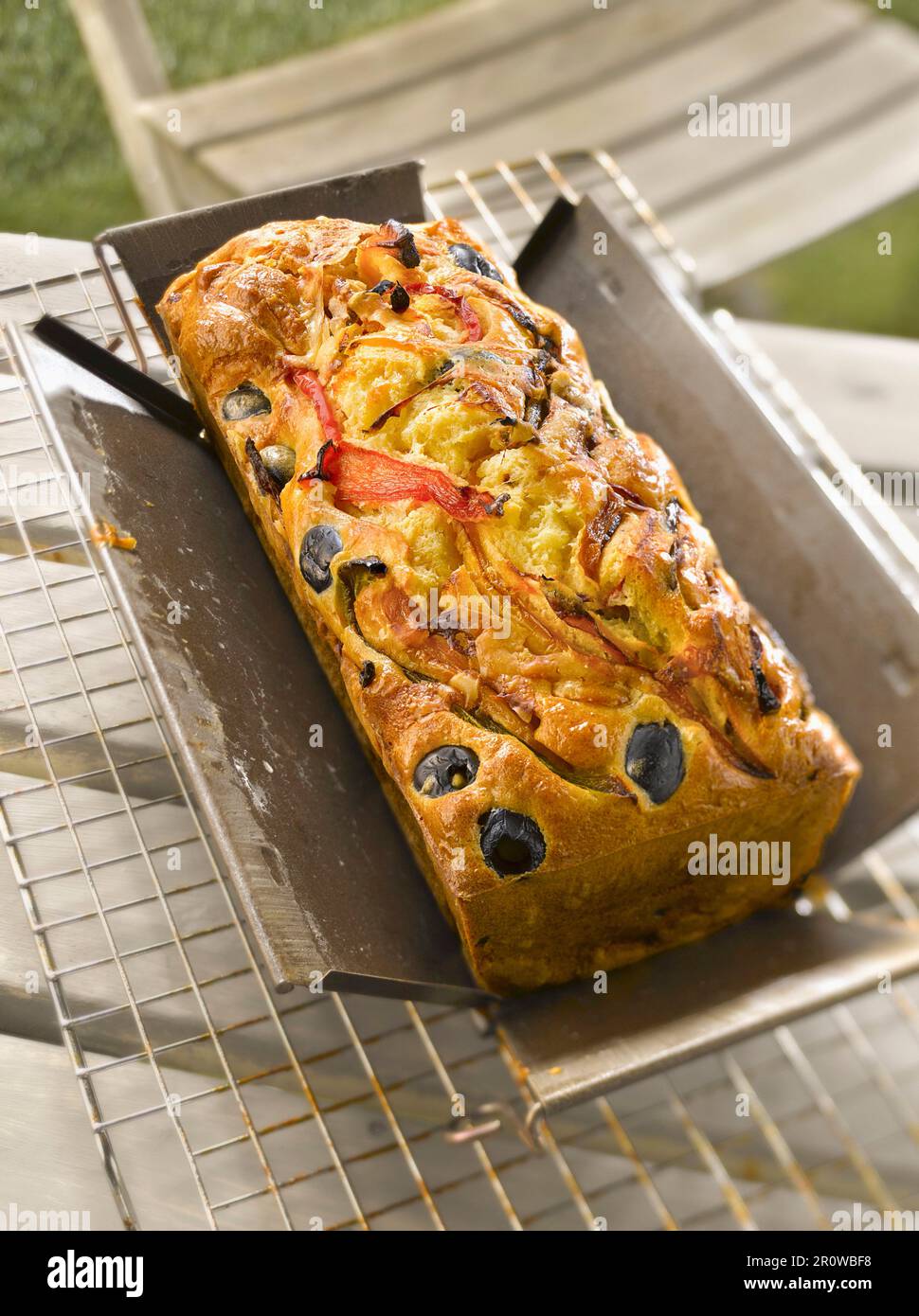 Grilled pepper, olive and pecorino savoury cake Stock Photo - Alamy