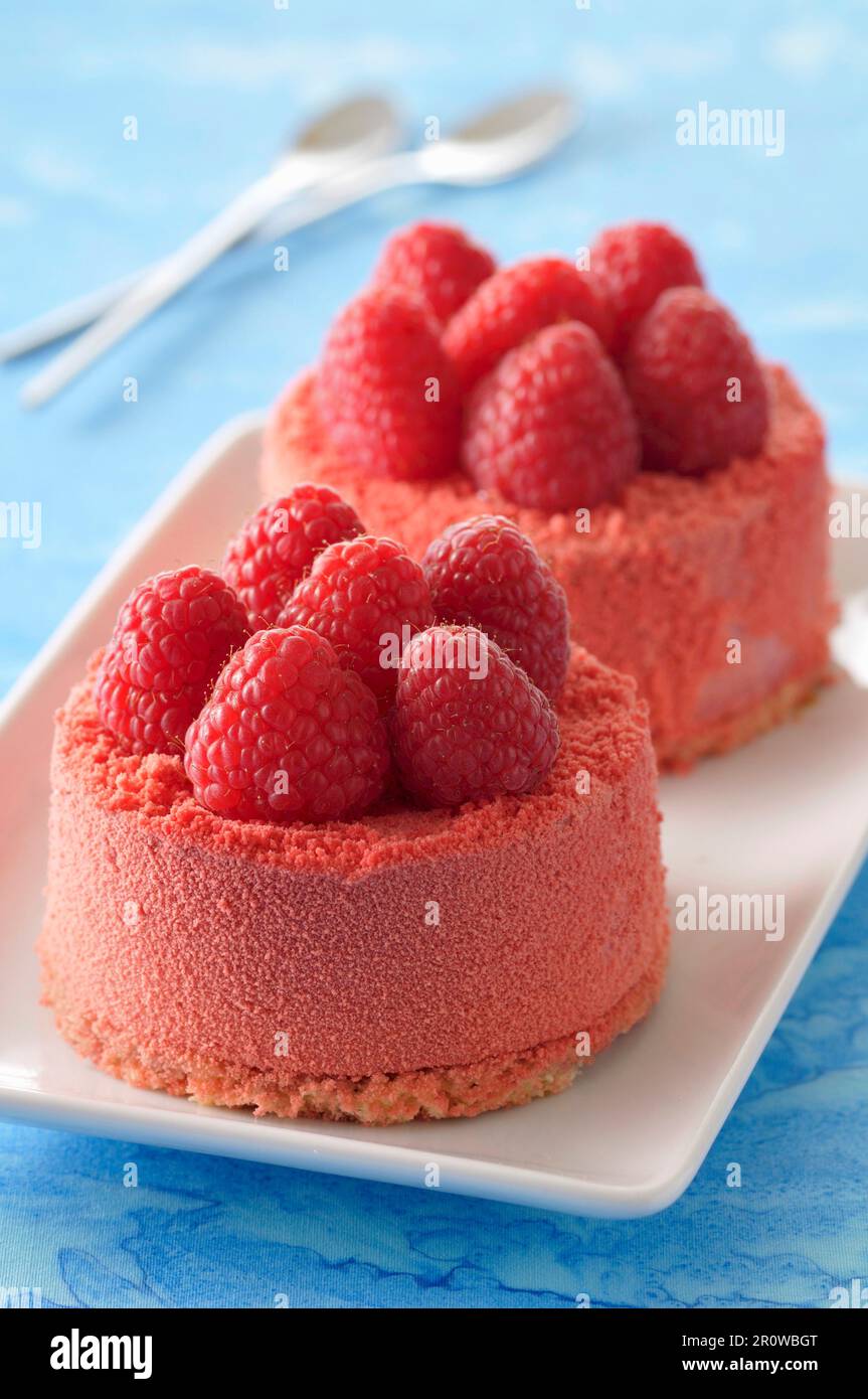 Individual raspberry mousse desserts Stock Photo - Alamy