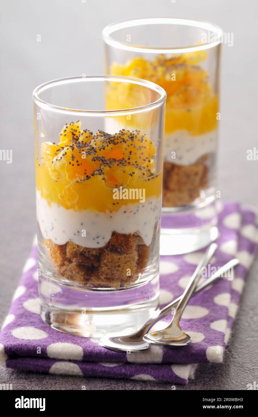 Layered gingerbread, yoghurt and orange Verrines with poppyseeds Stock ...