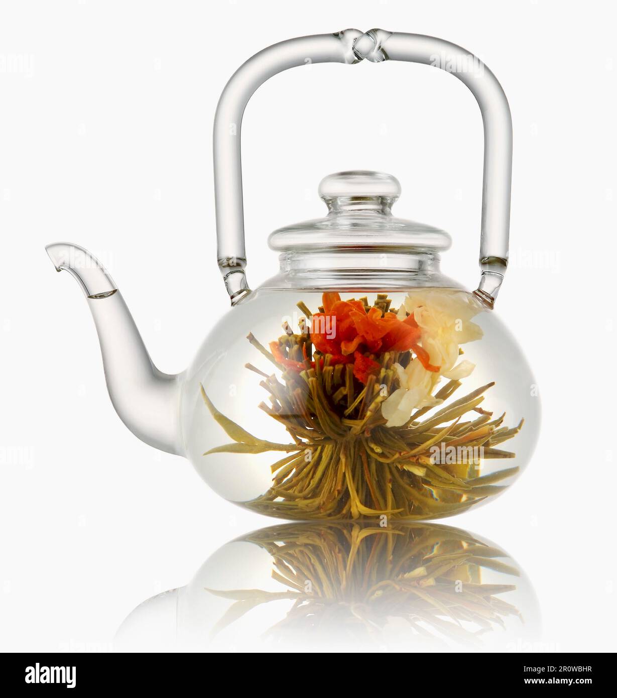 Glass teapot with tea flower Stock Photo - Alamy