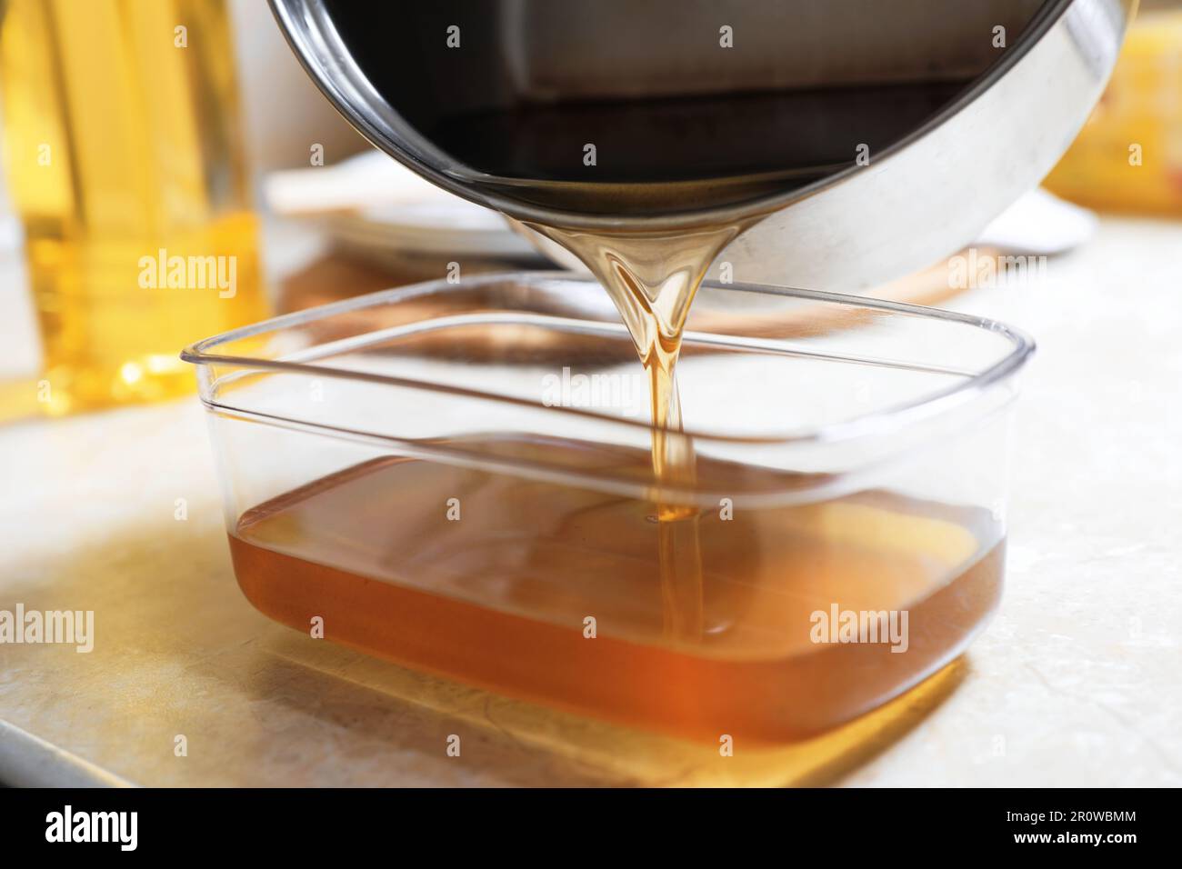 Pouring used cooking oil hi-res stock photography and images - Alamy