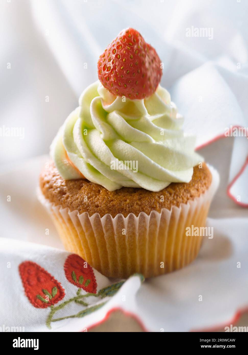 Lime and strawberry cupcake Stock Photo - Alamy