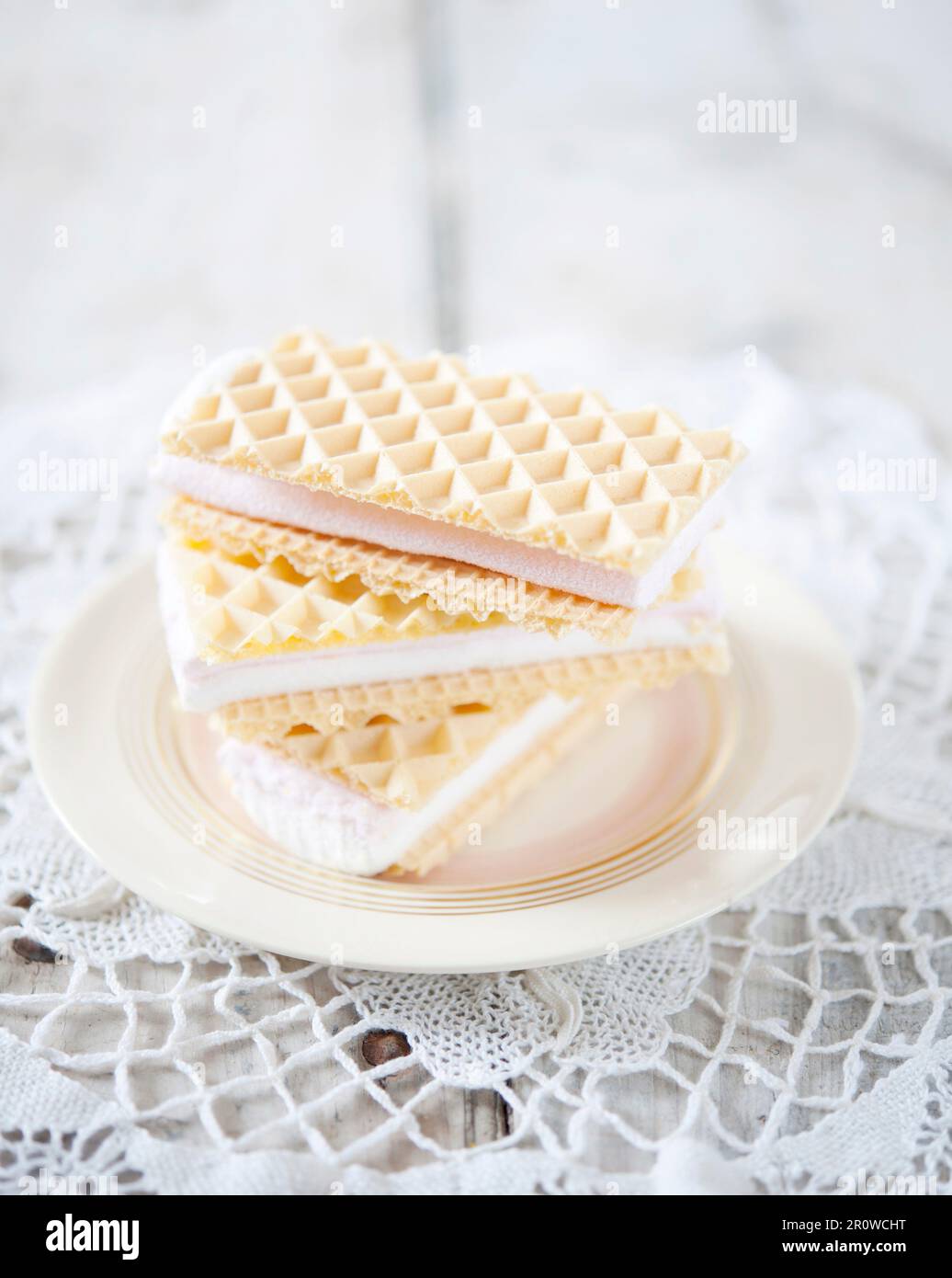 Waffle biscuits with pink filling Stock Photo - Alamy