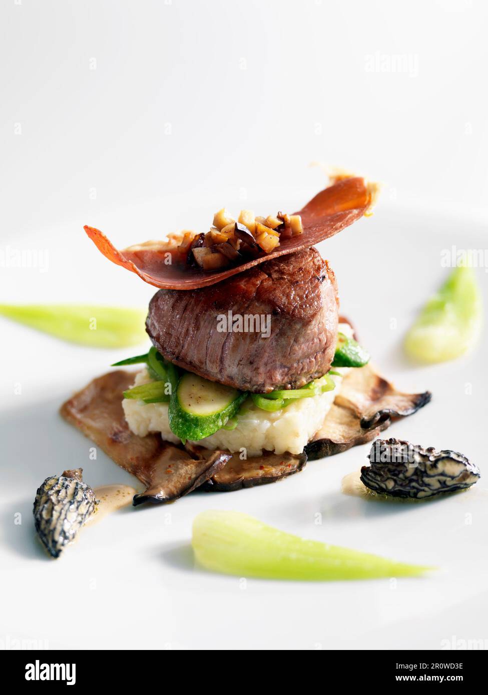 Veal Grenadin with lentils Stock Photo - Alamy