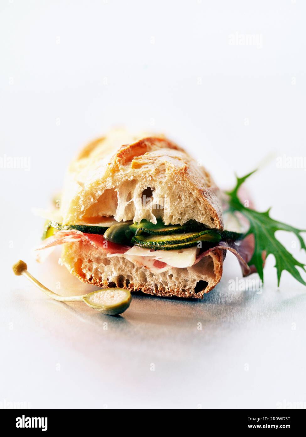 Raw ham and zucchini baguette sandwich Stock Photo - Alamy