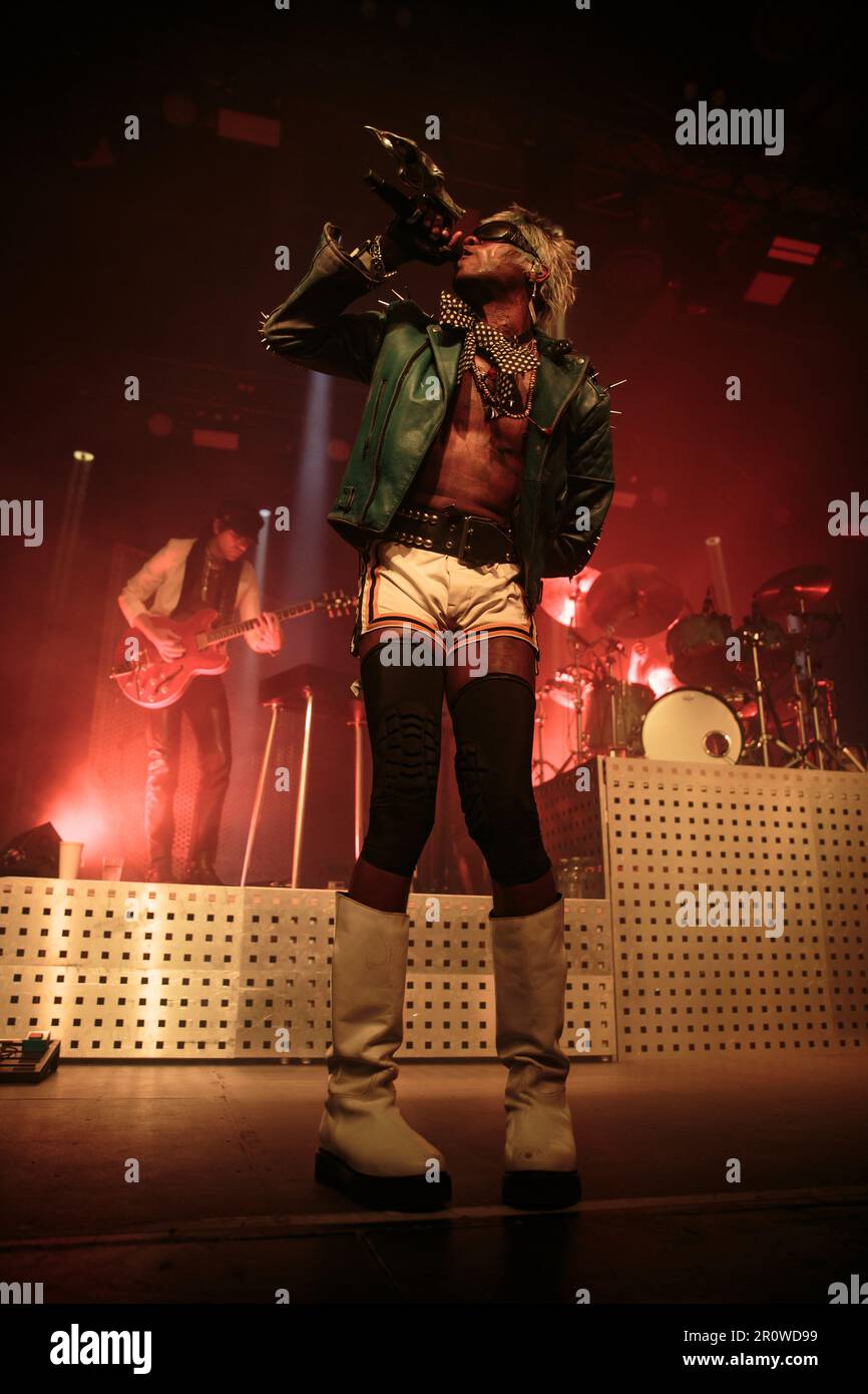 Toronto, Canada. 09th May, 2023. Yves Tumor singing into a microphone ...