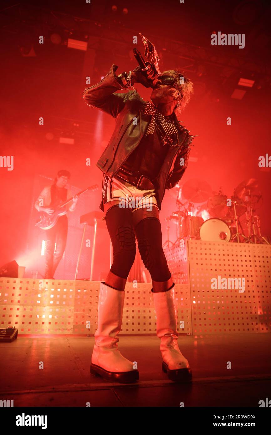 Toronto, Canada. 09th May, 2023. Yves Tumor singing into a microphone ...