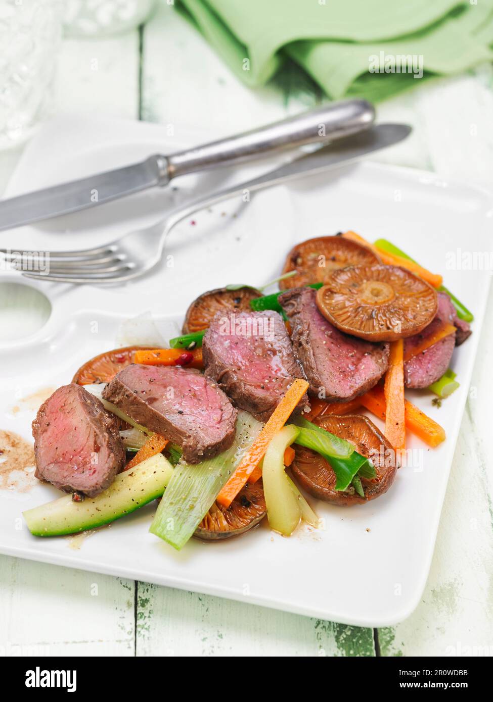 Stag fillet with mushrooms and vegetables Stock Photo - Alamy