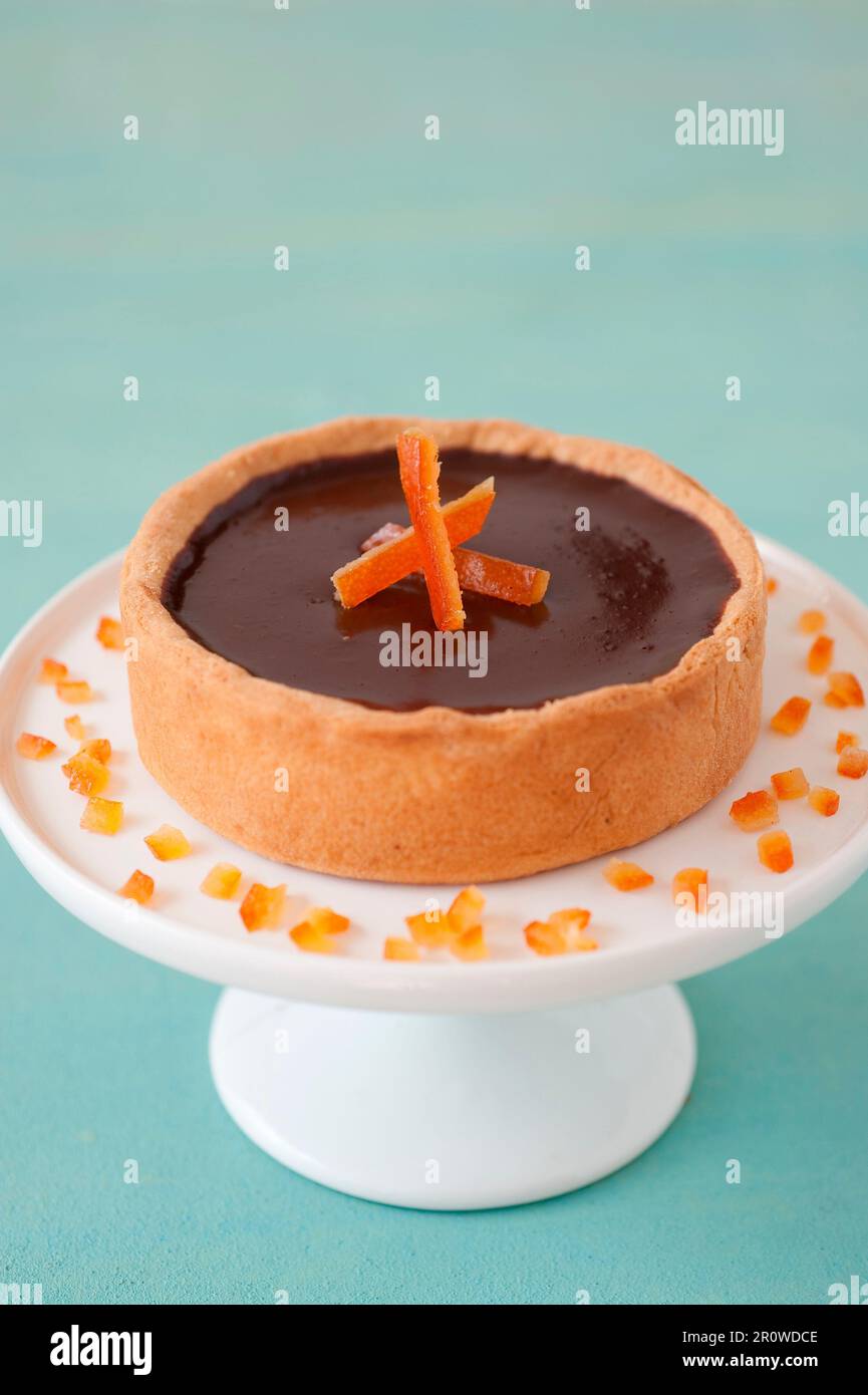 Chocolate and crystallized orange rind tartlet Stock Photo - Alamy