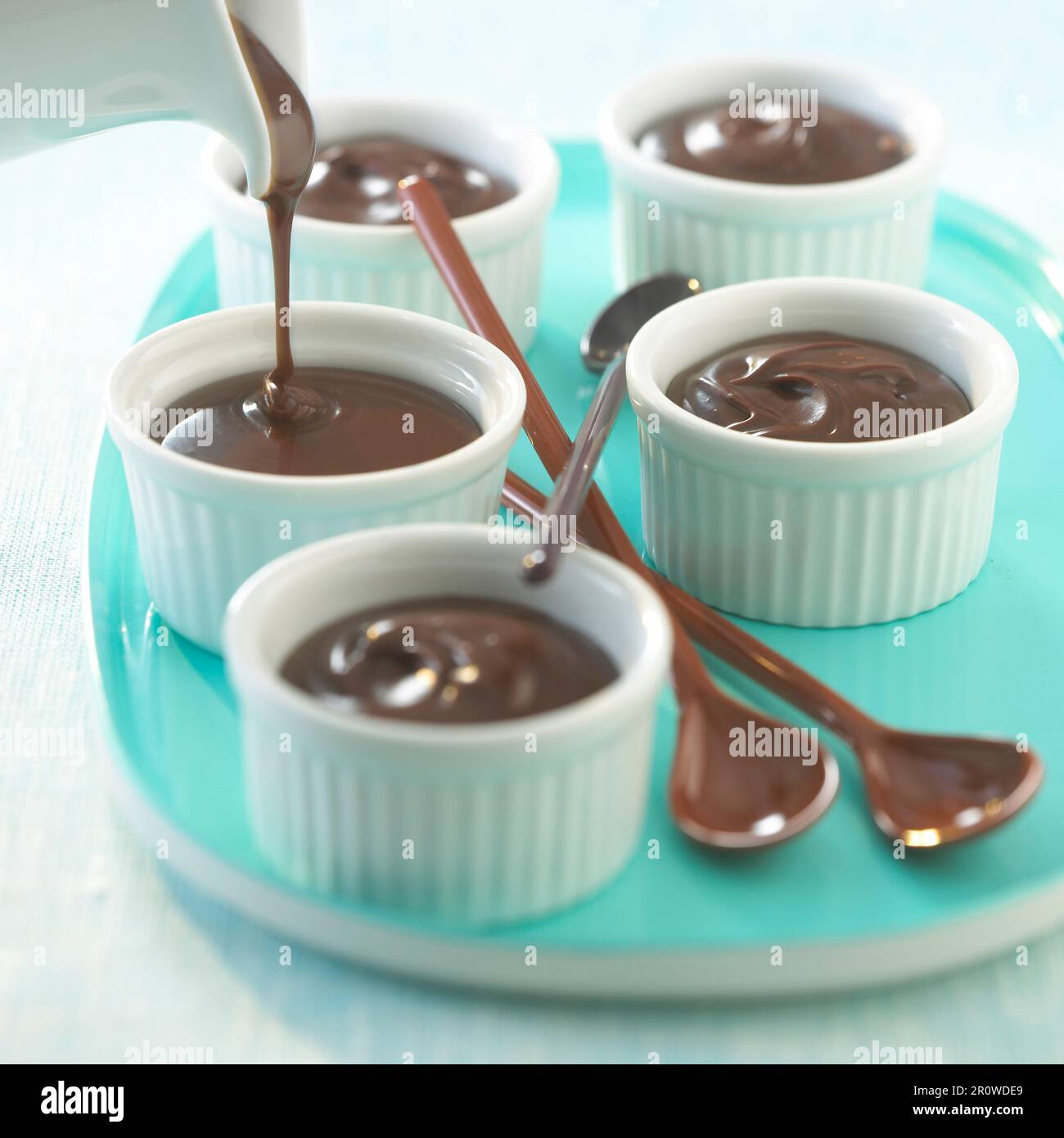 Pouring chocolate molds hi-res stock photography and images - Alamy
