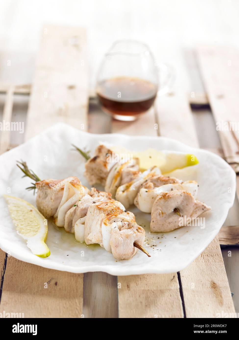 Turkey and squid skewers Stock Photo - Alamy