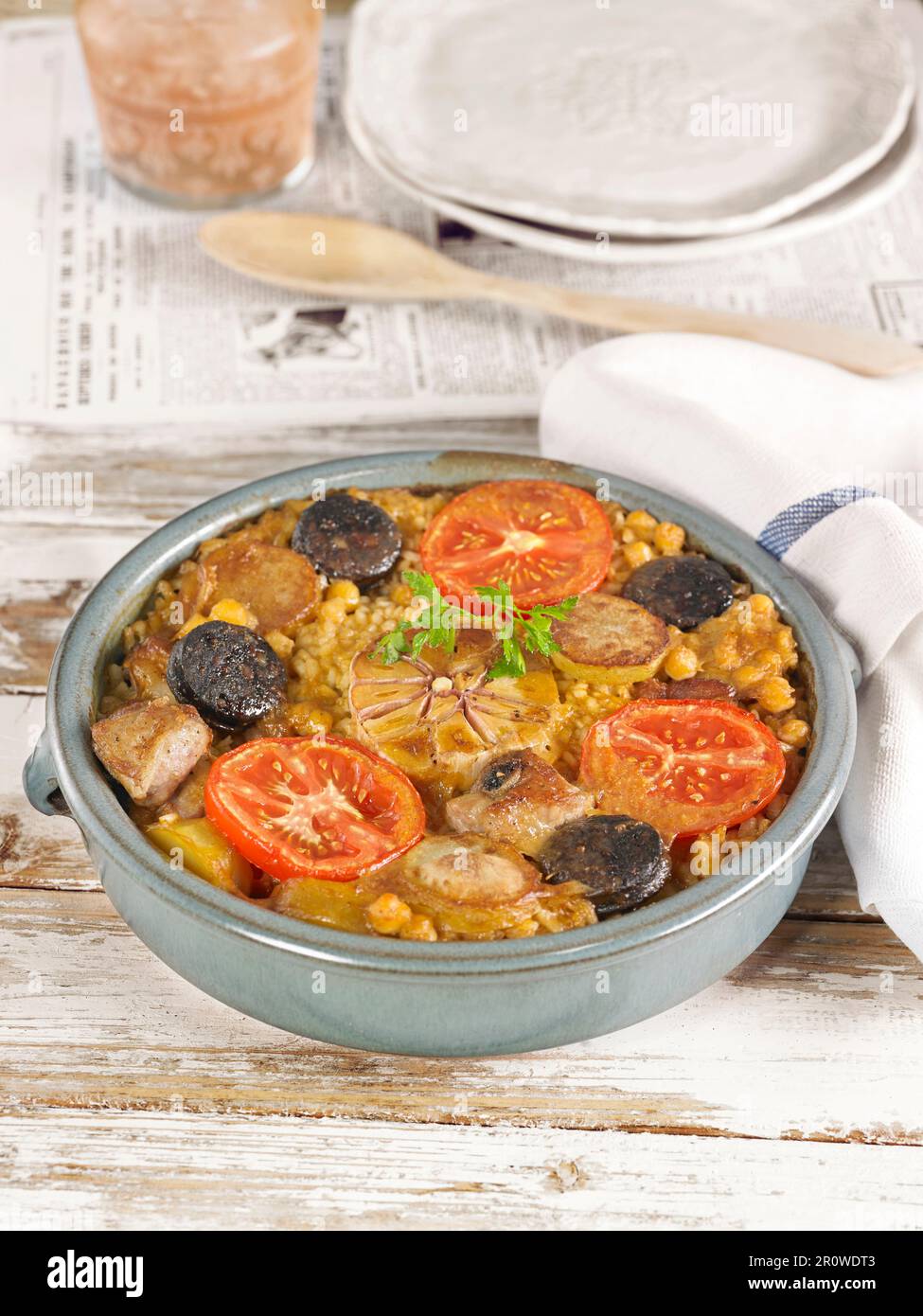 Rice, vegetable and botifarra bake Stock Photo - Alamy