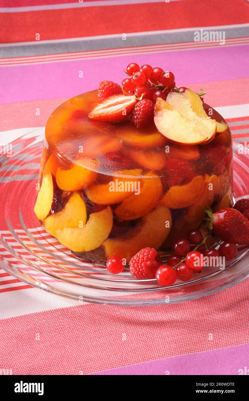 Summer fruits in fruit jelly Stock Photo - Alamy