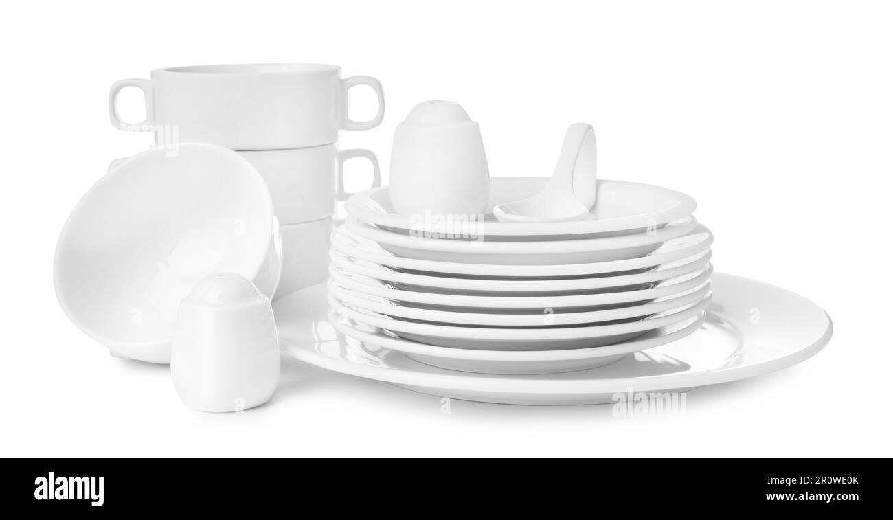 Set of clean dishware isolated on white Stock Photo - Alamy