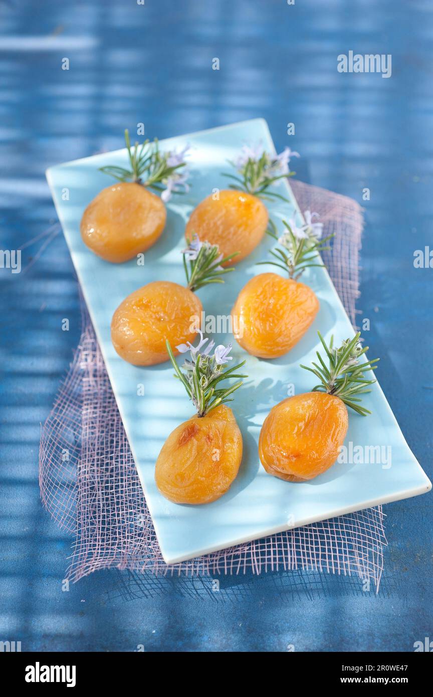 Roasted apricots with rosemary Stock Photo - Alamy