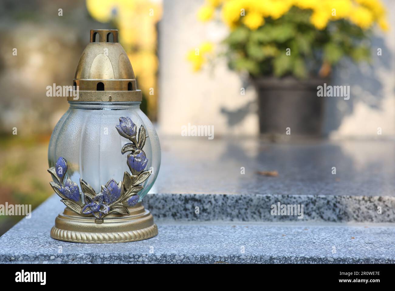 Grave lantern on granite surface in cemetery, space for text Stock Photo - Alamy