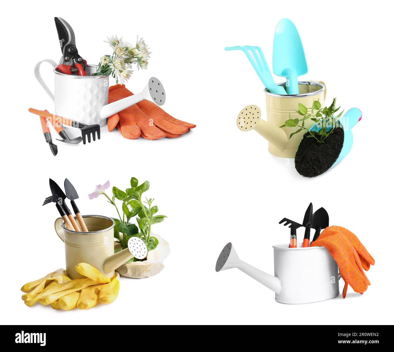 Set with watering cans and different gardening tools on white ...