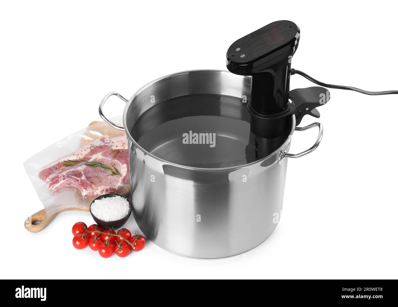 Thermal immersion circulator in pot and ingredients on white background ...