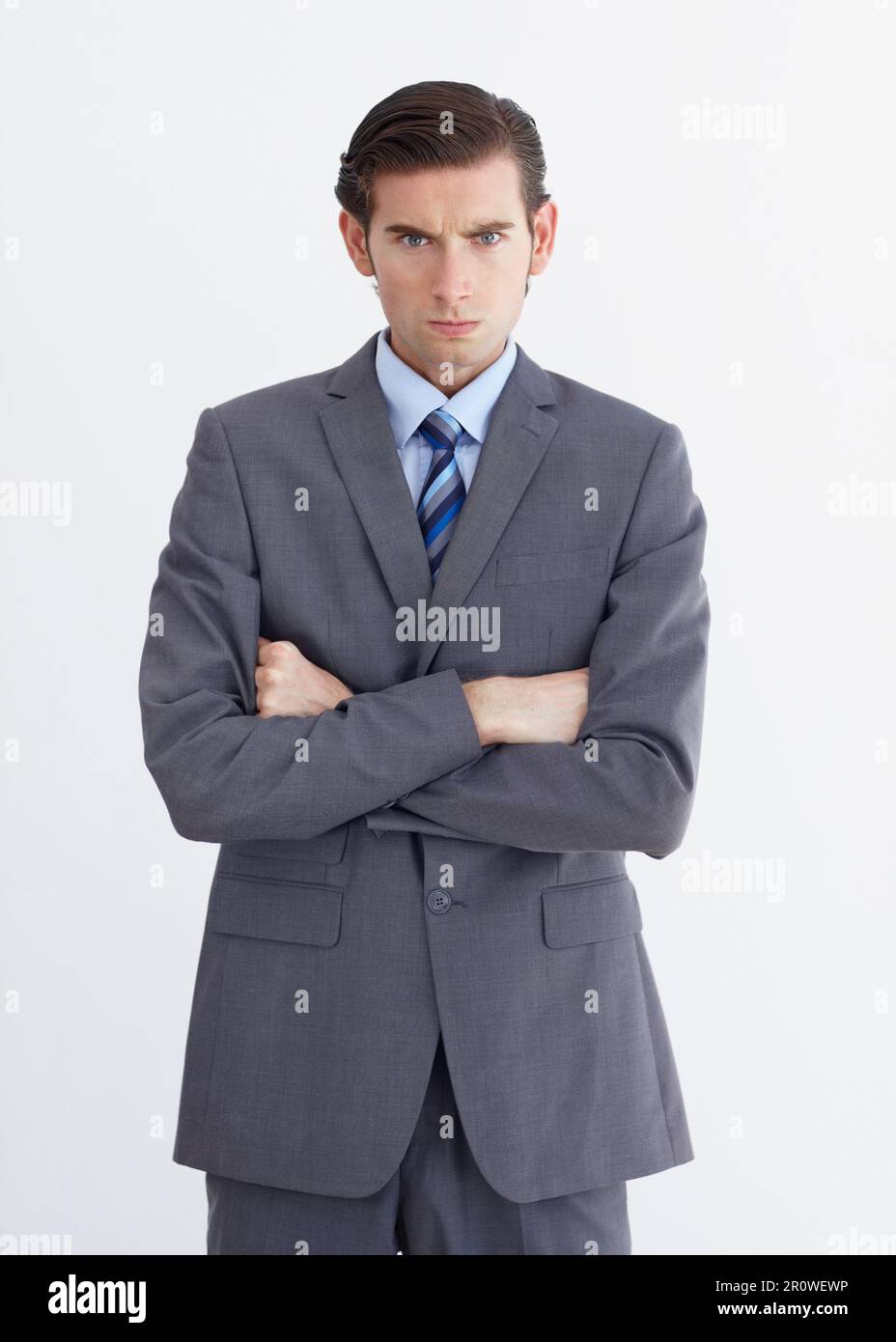 Anger, crossed arms and portrait of business man on white background ...