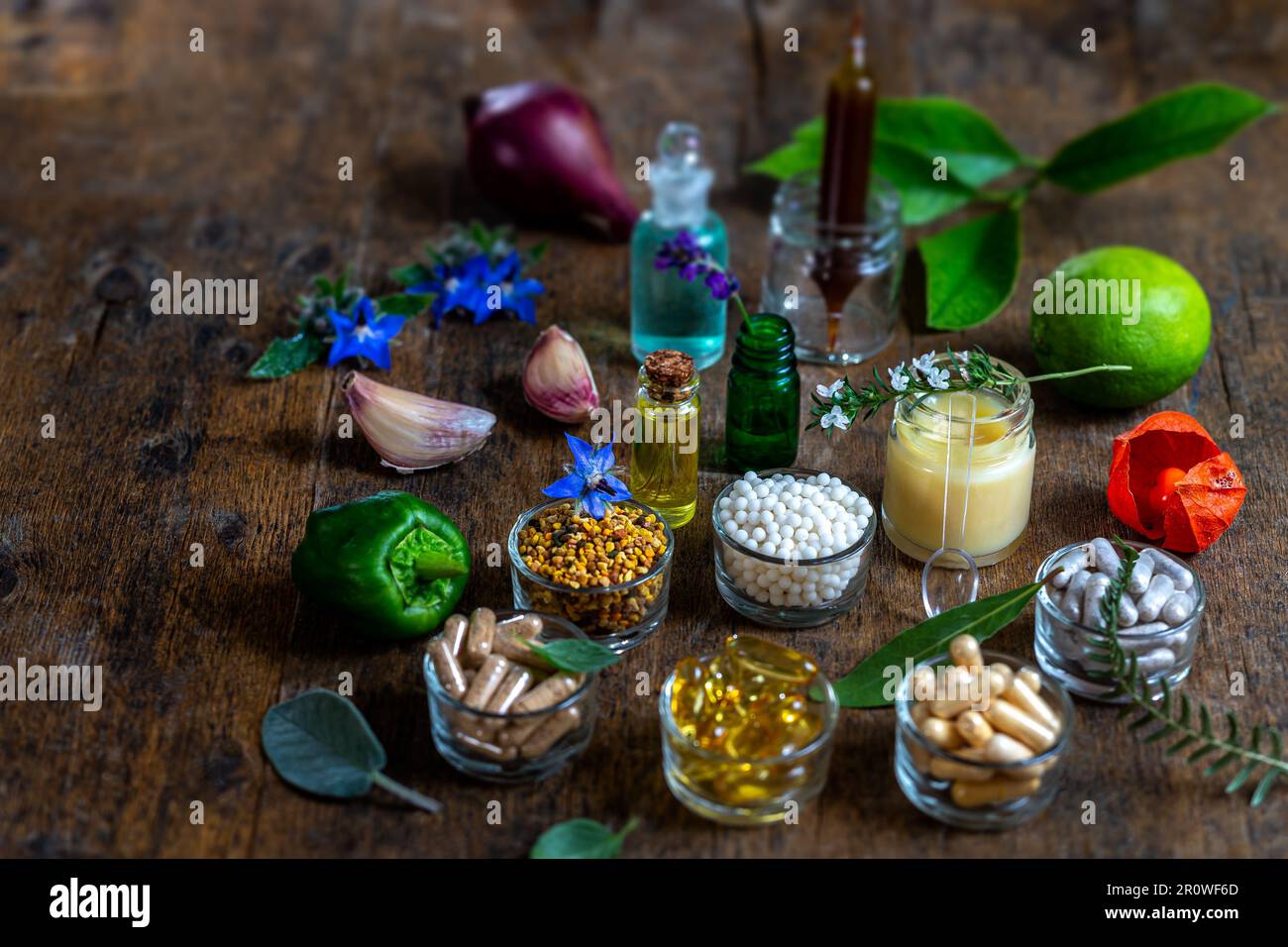 Food supplements,homeopathic pellets and essential oils Stock Photo - Alamy