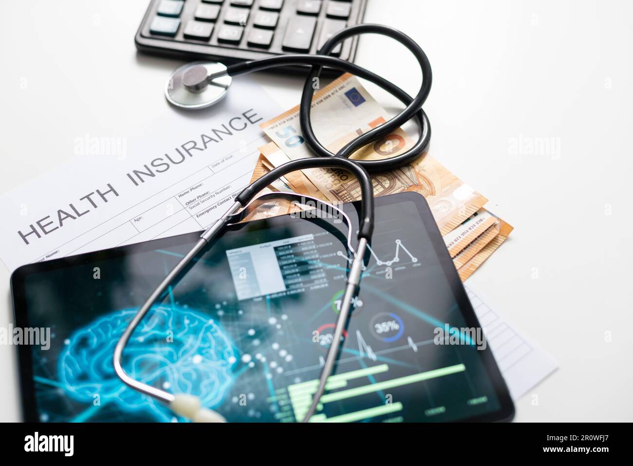 Modern social health insurance program. Tablet computer with healthcare ...